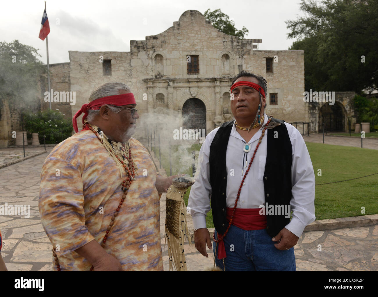 American Indian's Joe Fernandez and Adrian Ramirez sage the air and ...
