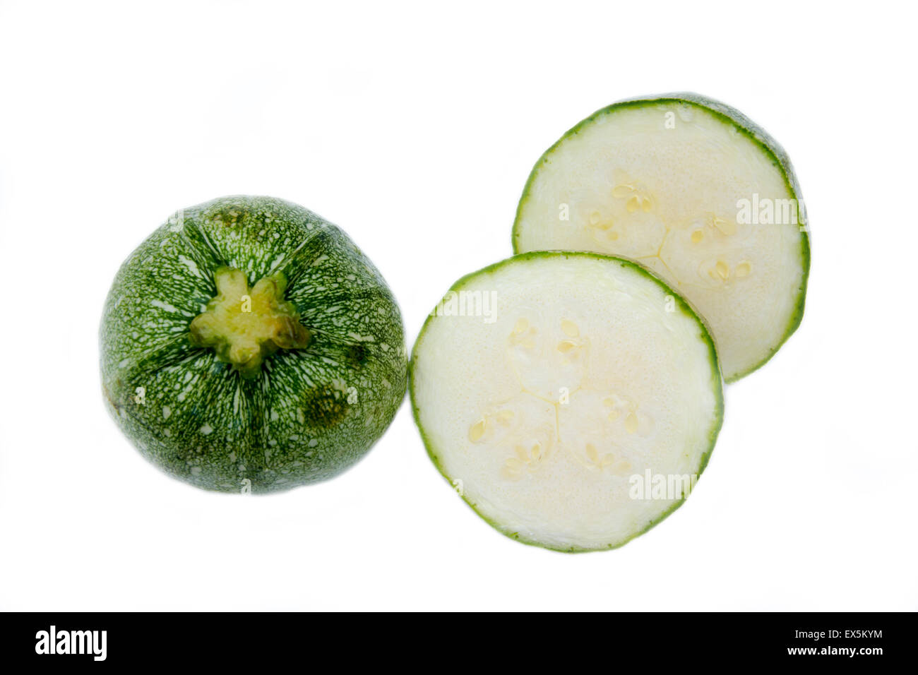 Round zucchini on a white background seen from above Stock Photo - Alamy