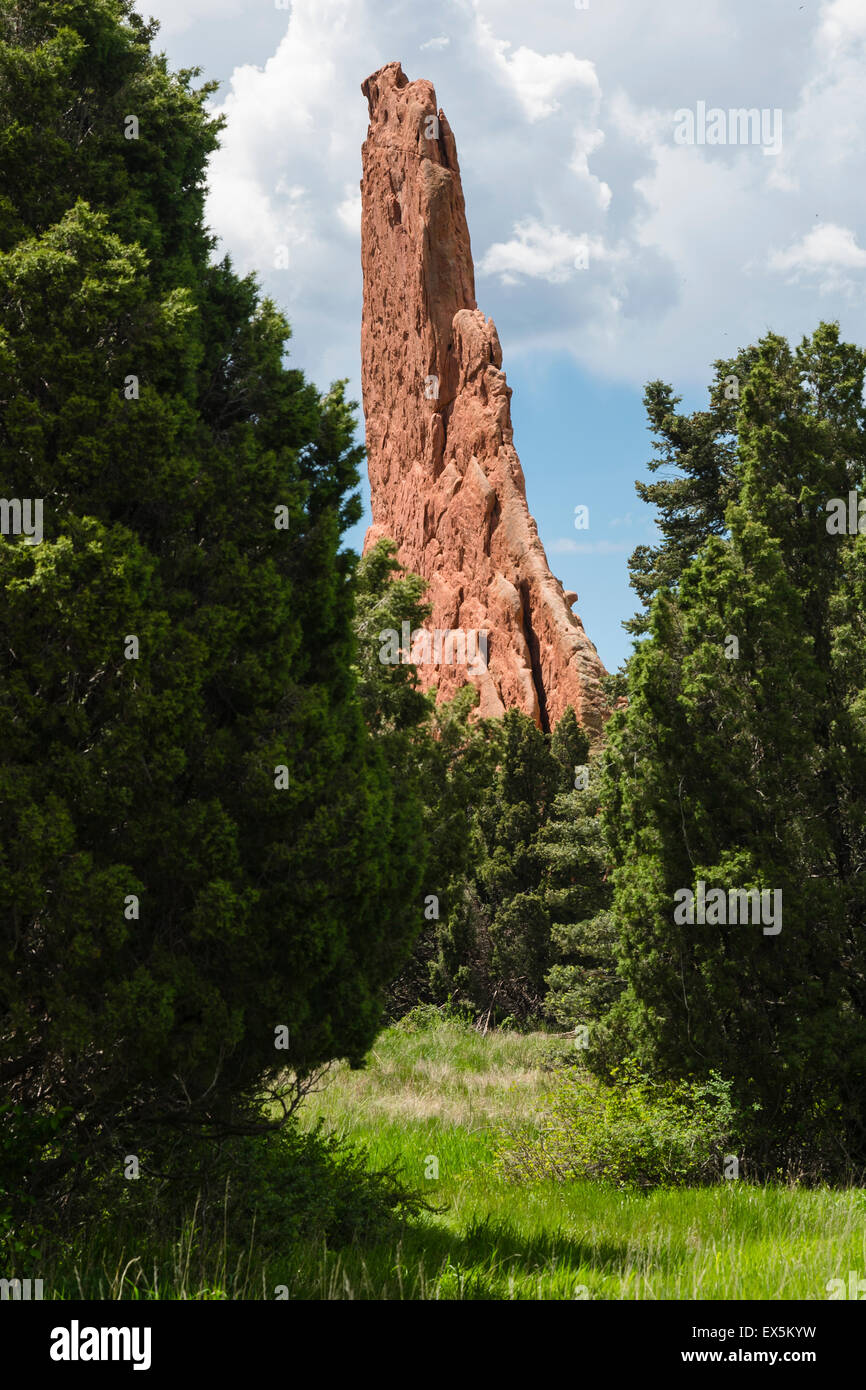 Etude with a red stone column surrounded by green trees, Garden of the ...