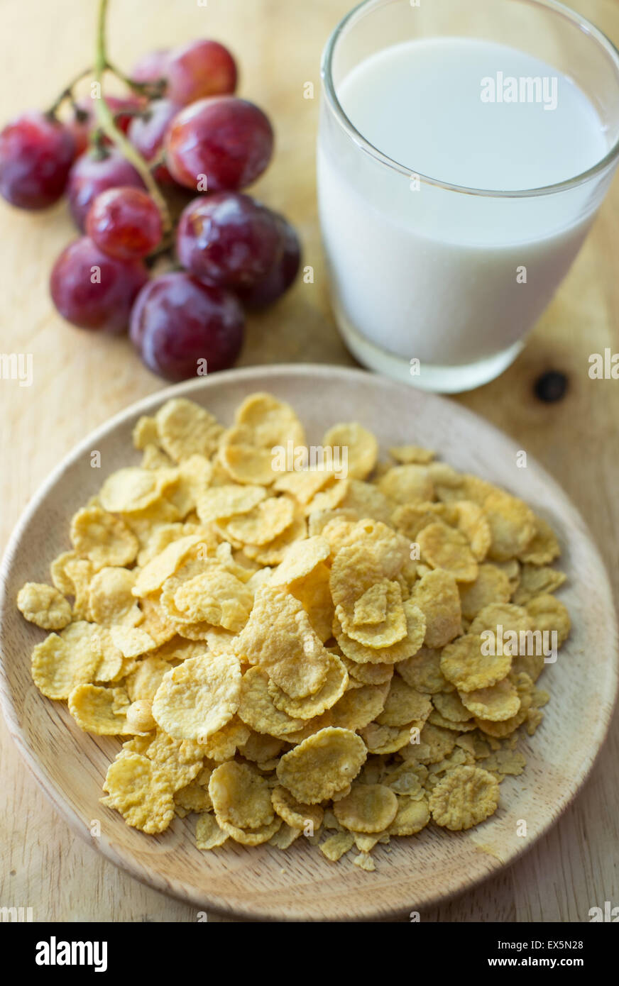 closeup sugar-coated corn flakes with grape background Stock Photo - Alamy
