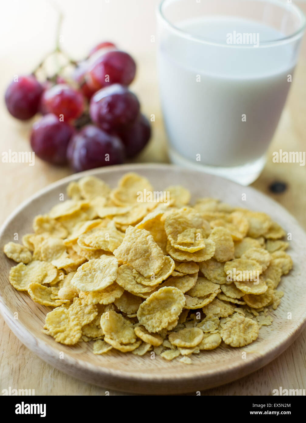 closeup sugar-coated corn flakes with grape background Stock Photo - Alamy