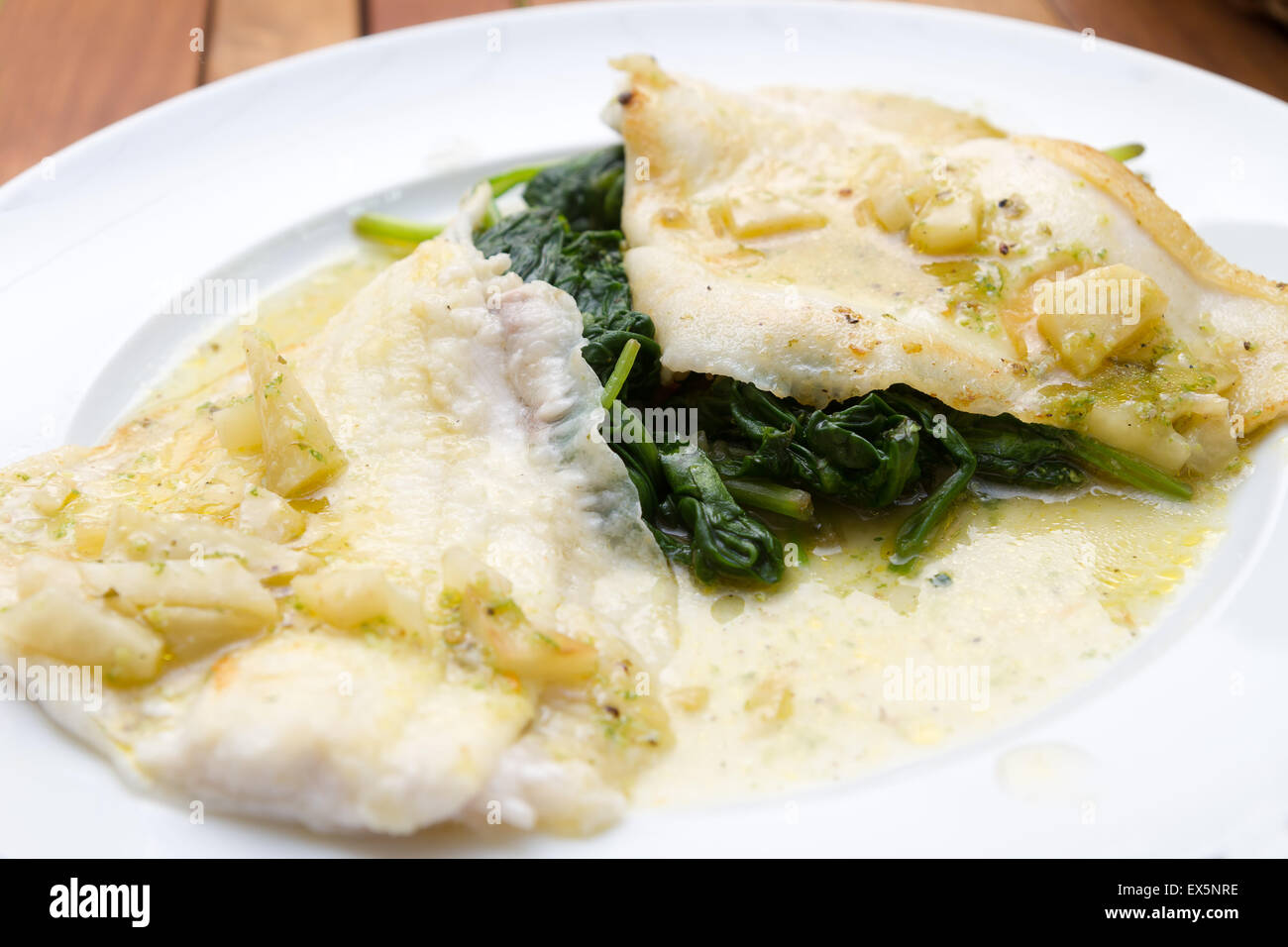 Plaice fillet with spinach Stock Photo - Alamy