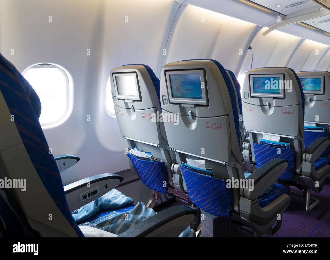 Tv airplane seats tv screen hi-res stock photography and images - Alamy
