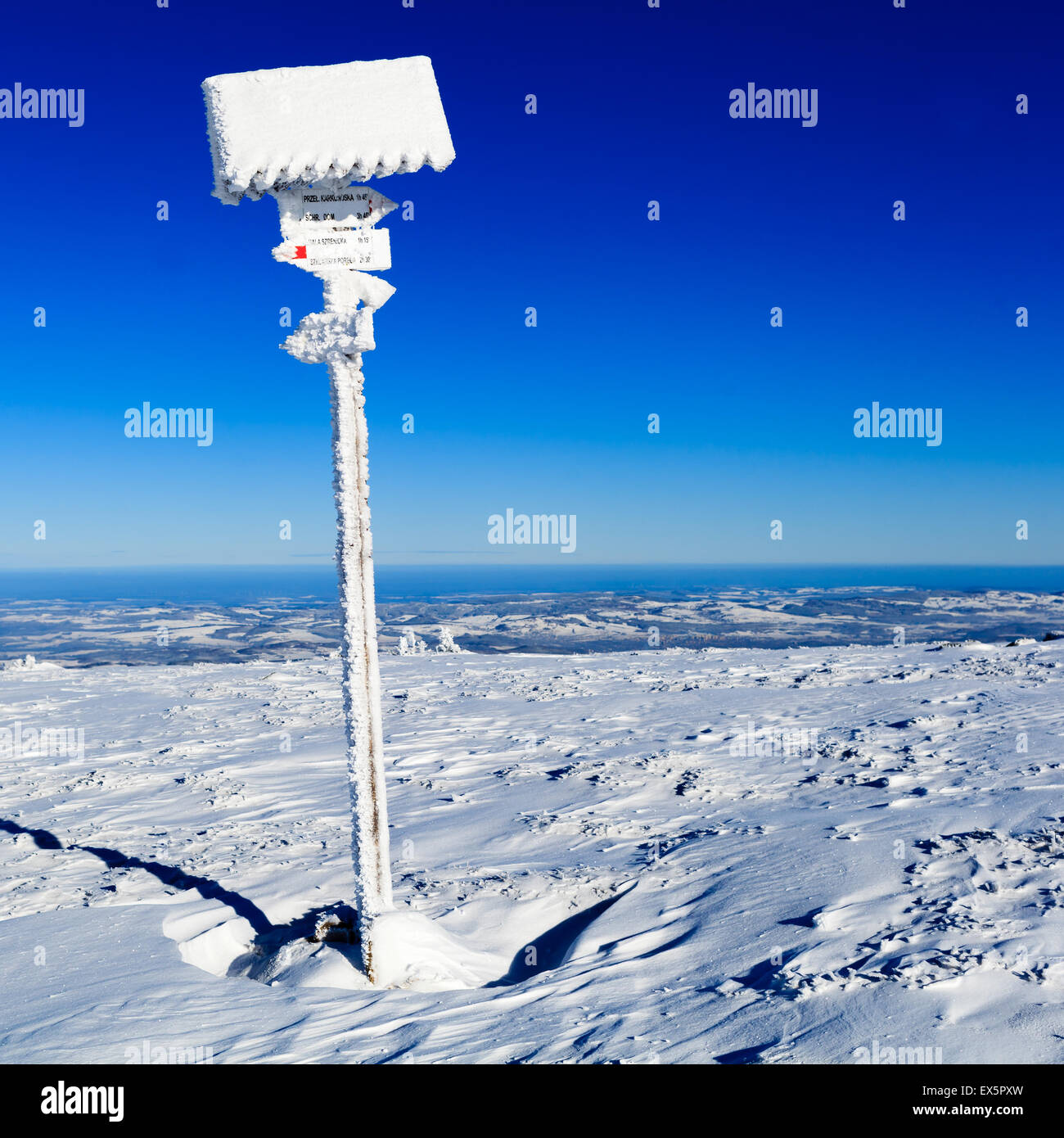 Sign and arrows in winter white mountains on snow. Inspirational ...
