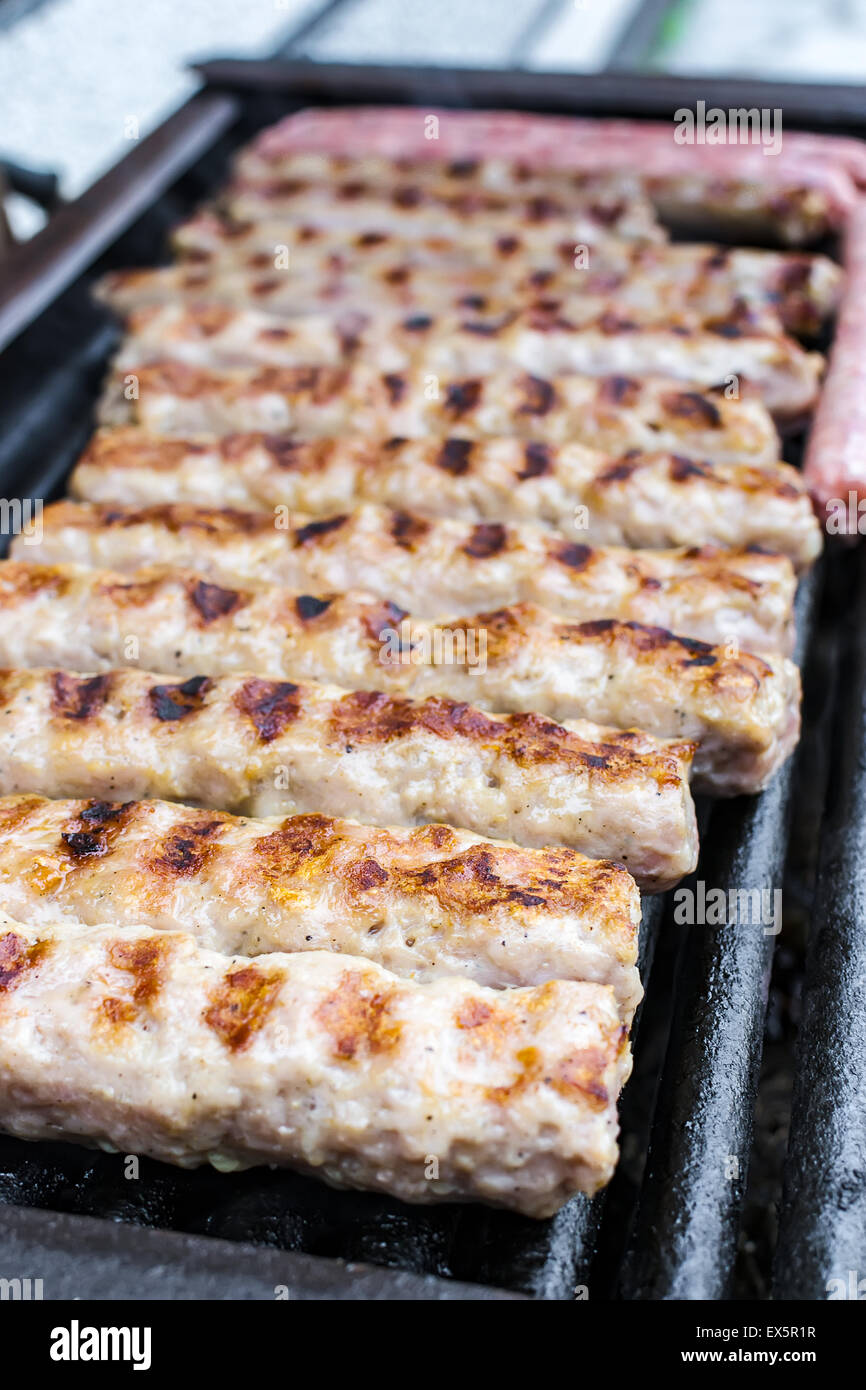Kebapche - a traditional Bulgarian dish meat roasted on an electric ...