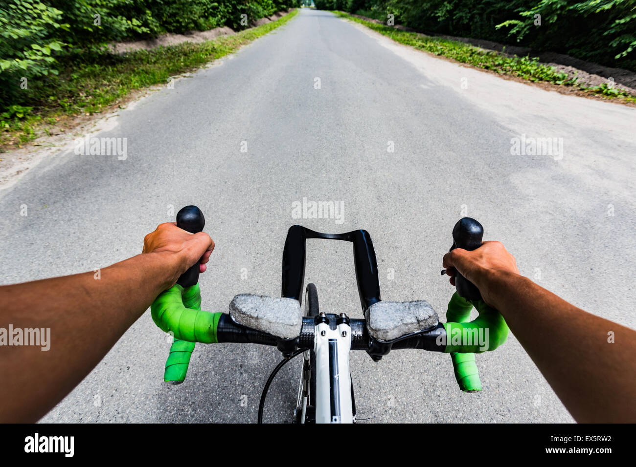 Cycling in the forest. Eye view from cyclist head Stock Photo - Alamy