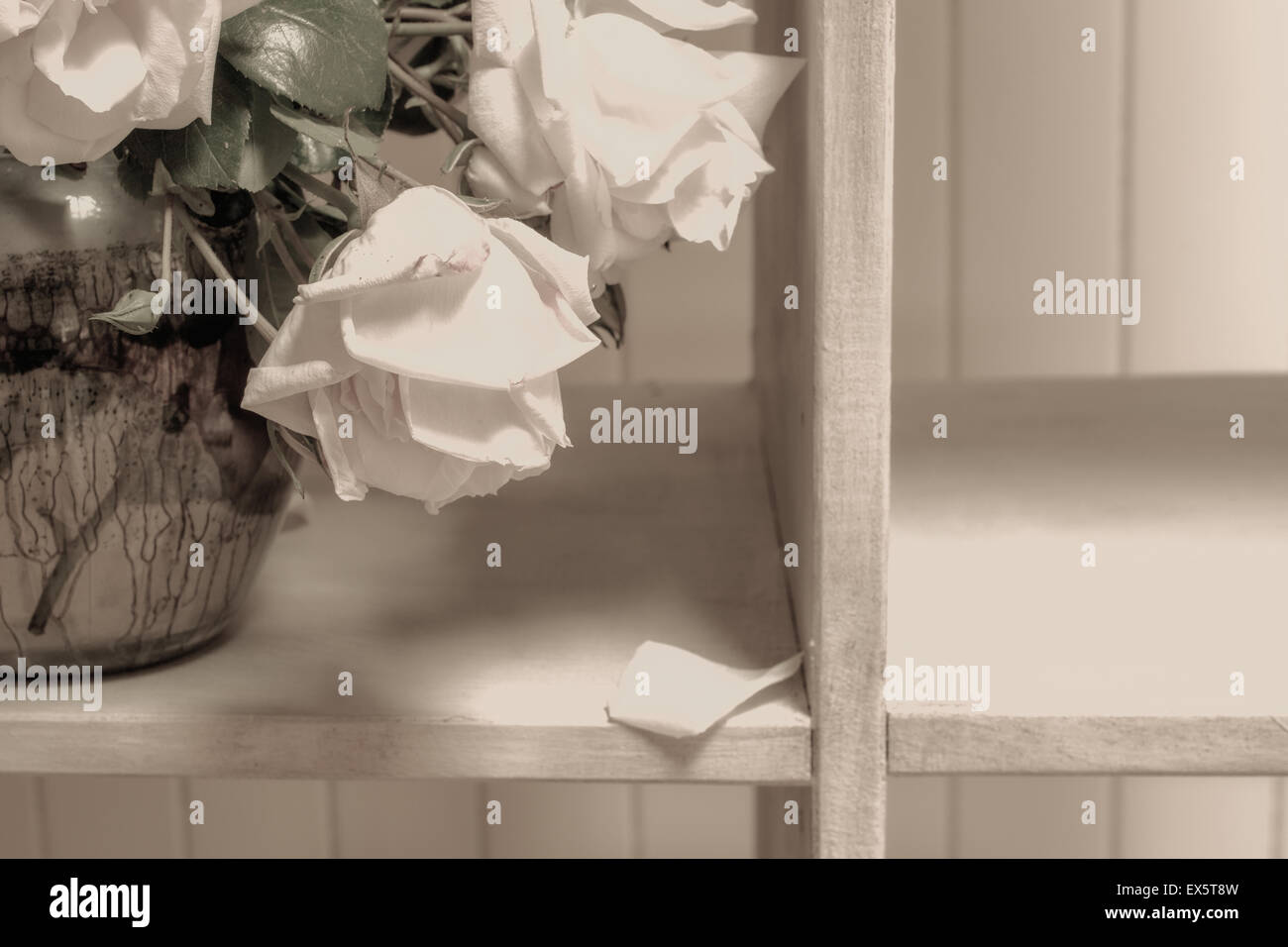 vintage roses on shelf Stock Photo - Alamy