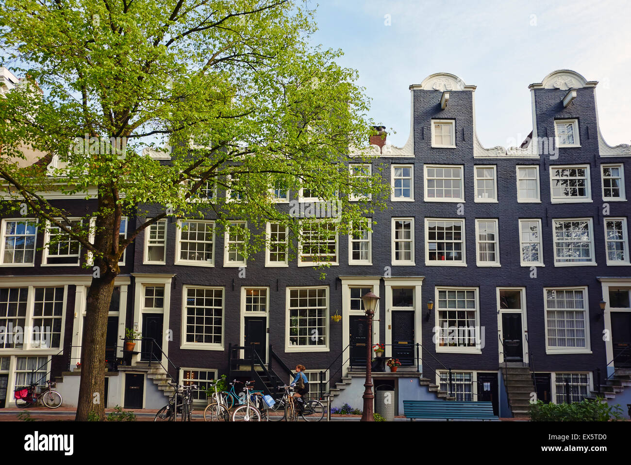 Typical narrow and tall canalside houses in Amsterdam, Netherlands, EU ...