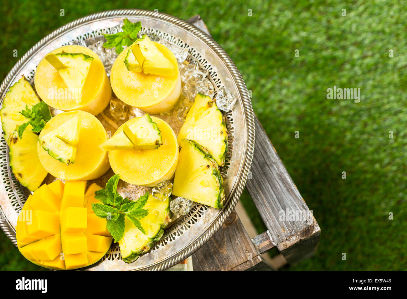 Homemade low calorie popsicles made with mando, pineapple and cocconut ...