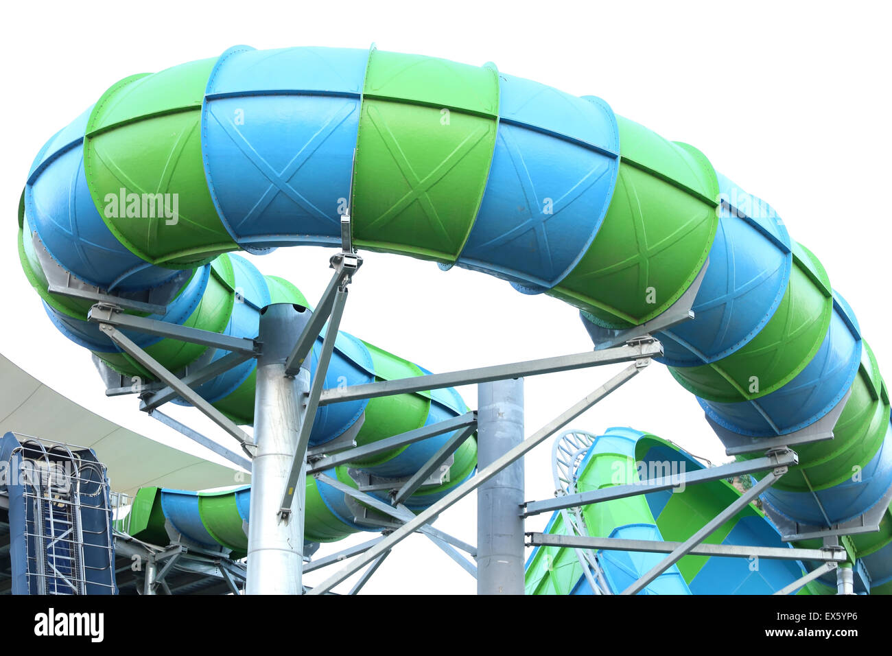Slider in swimming pool with sky background Stock Photo - Alamy