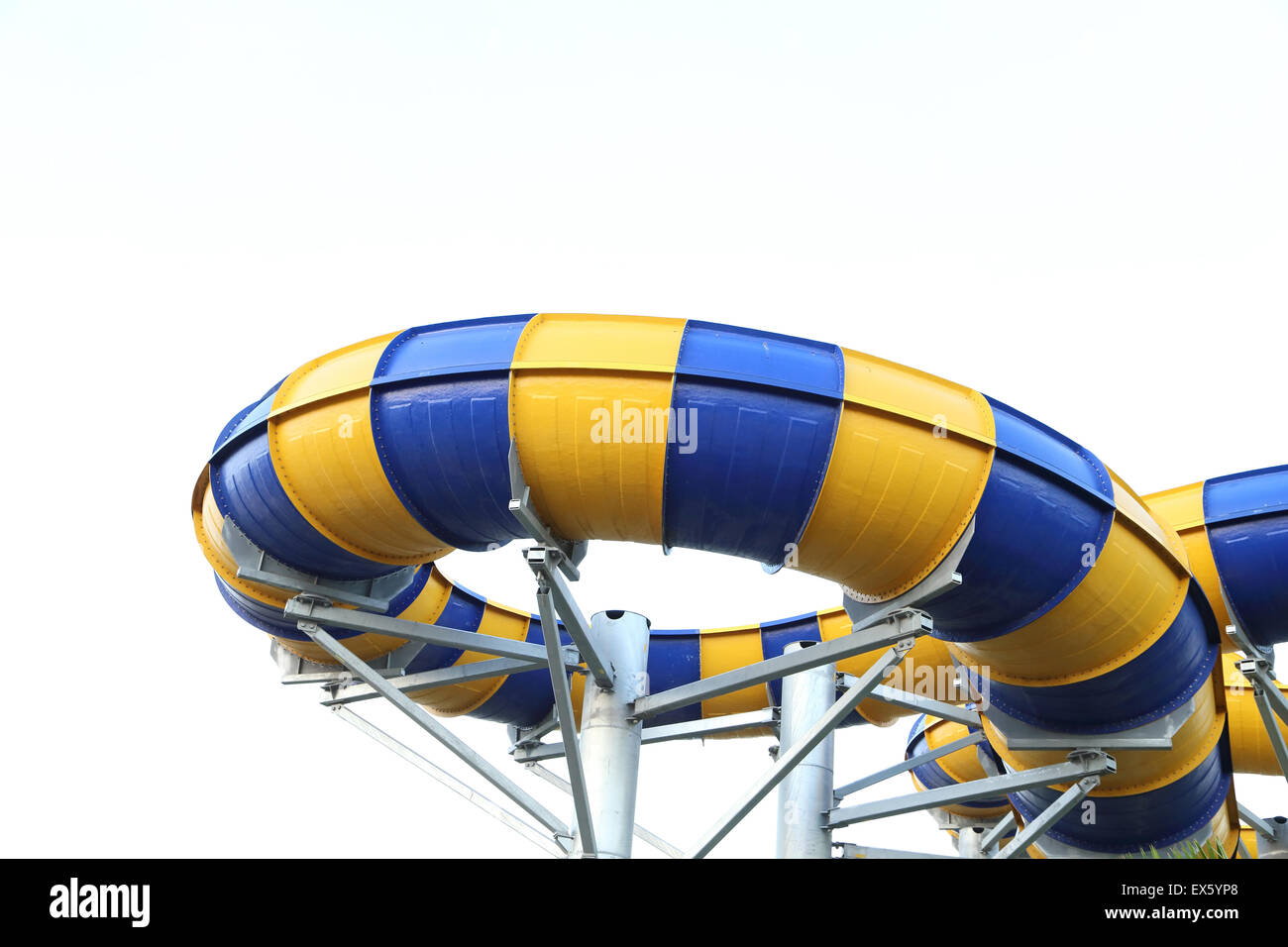 Slider in swimming pool with sky background Stock Photo - Alamy