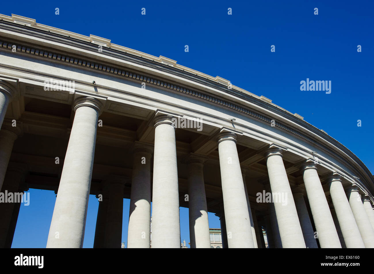 Part of colonnade in St Peter square in Rome, Italy, Vatican City, with ...
