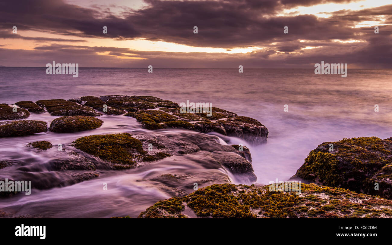 Clouds over rocks water hi-res stock photography and images - Alamy