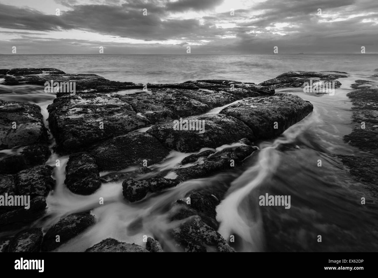 Water running over pebbles or rocks hi-res stock photography and images ...
