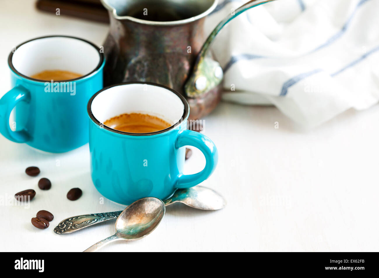 Cups of coffee and coffee pot Stock Photo - Alamy