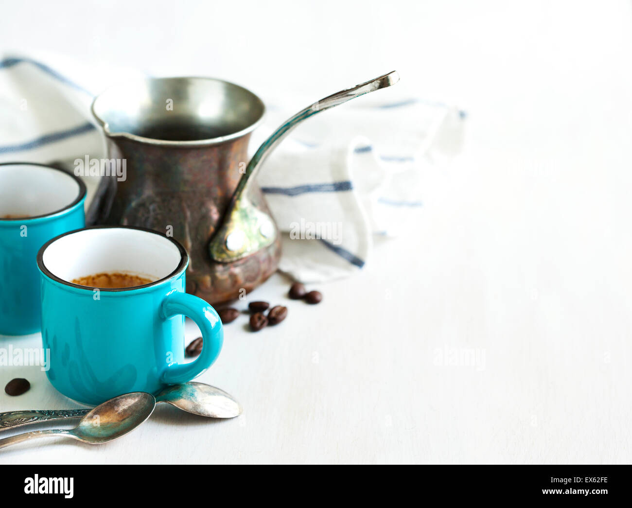 Cups of coffee and coffee pot Stock Photo - Alamy