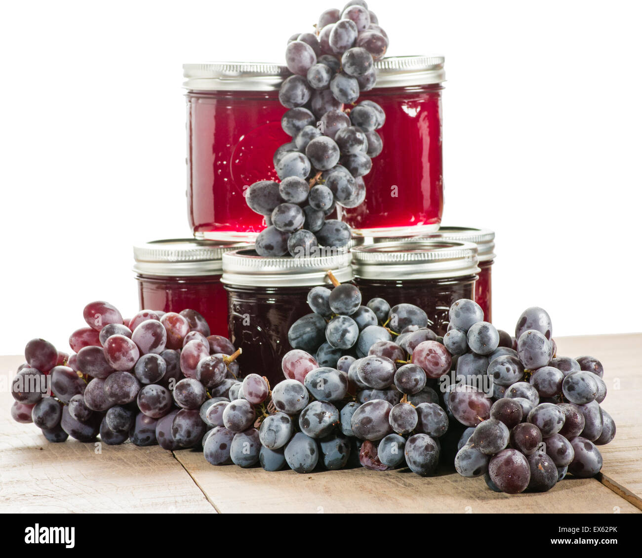Jars of grape jelly with grapes isolated on white Stock Photo - Alamy