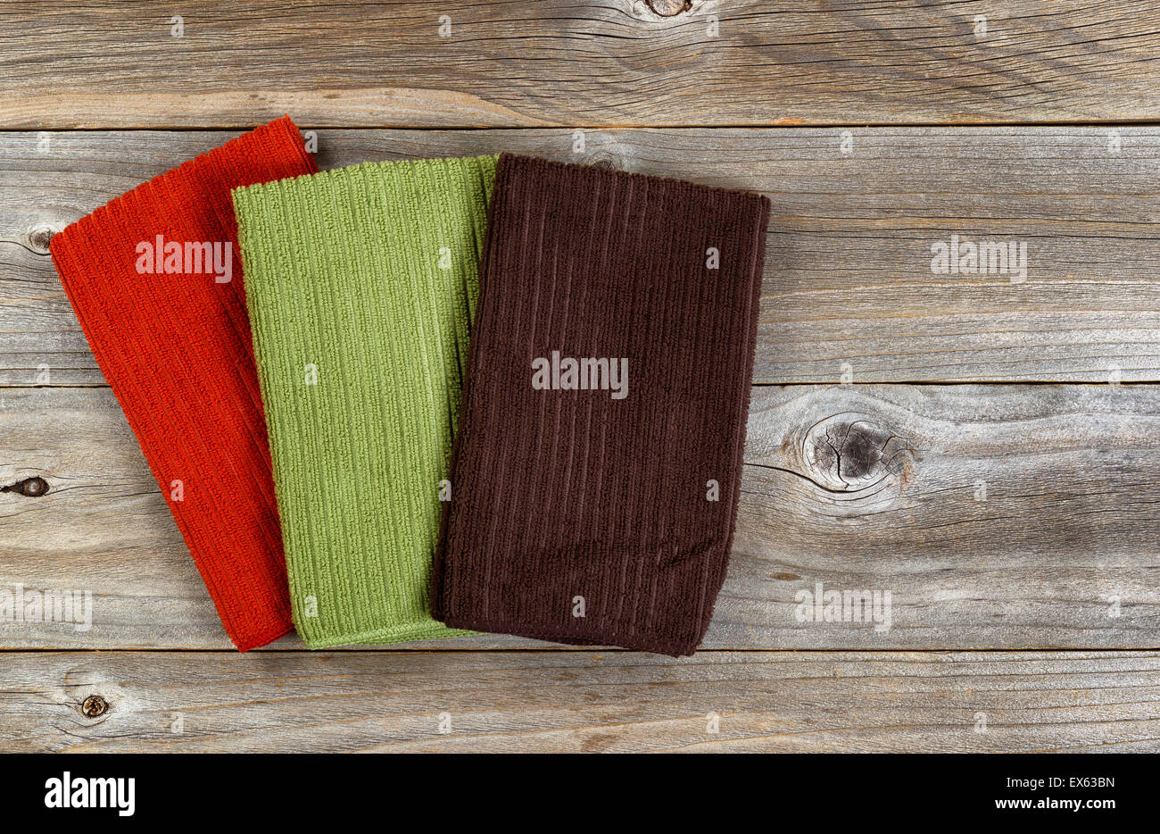 Colorful cleaning rags on rustic wooden boards Stock Photo - Alamy