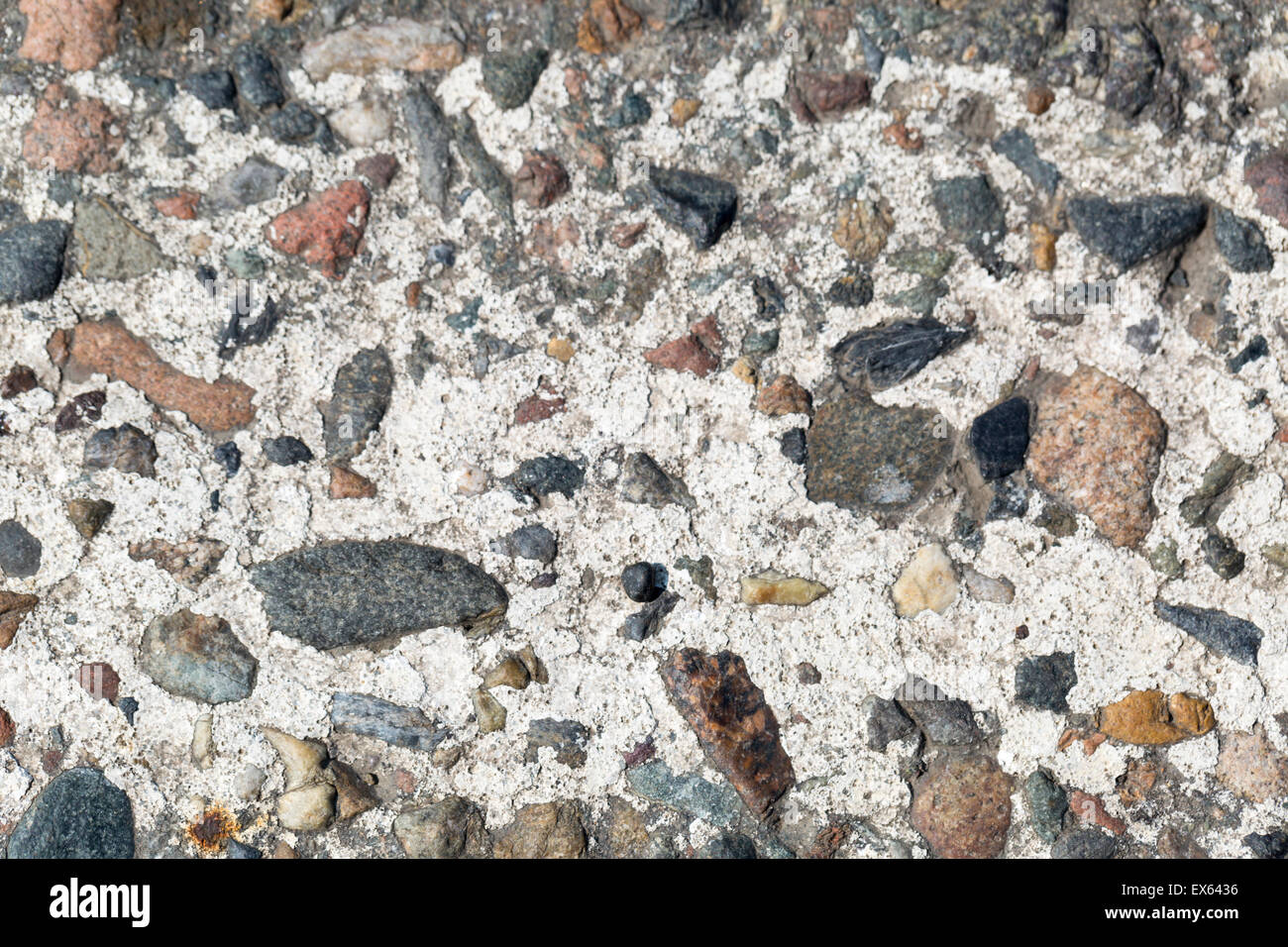 Asphalt with pebble stone texture from the street, light gray Stock ...
