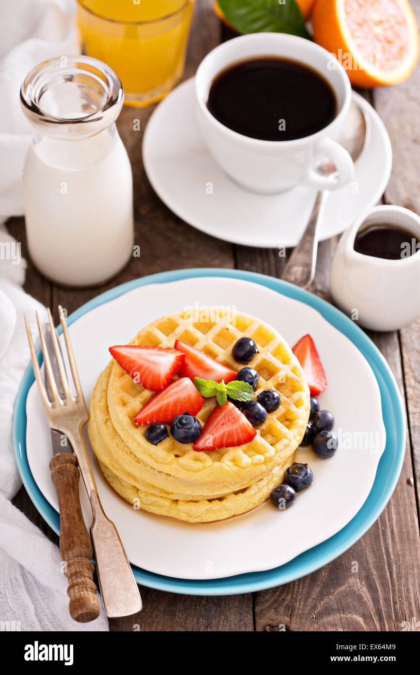 Breakfast waffles with fresh berries stacked on a plate Stock Photo - Alamy