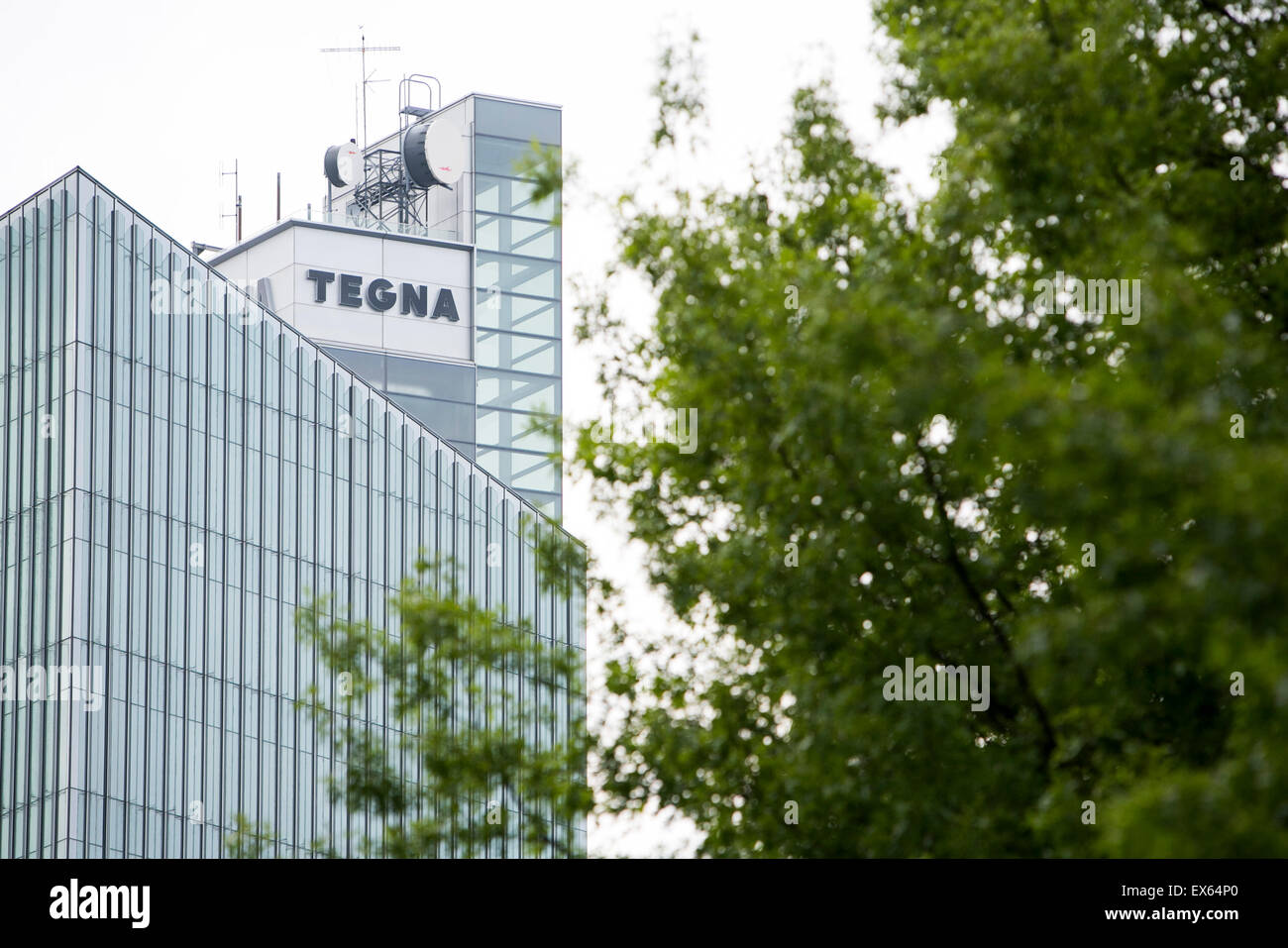 A logo sign outside of the joint headquarters of Gannett and the ...