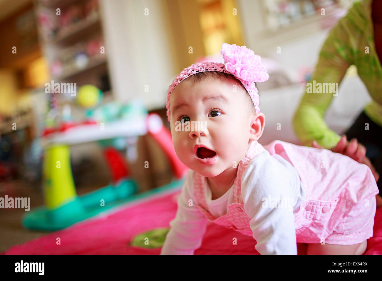 Baby Practice Crawling Stock Photo - Alamy