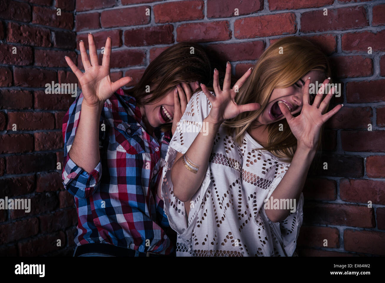 Woman running scared hi-res stock photography and images - Alamy