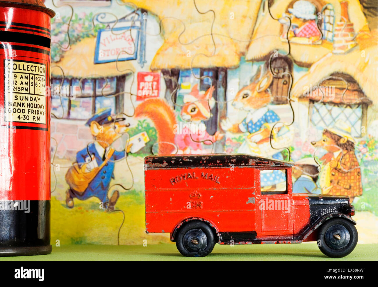 dinky post van and postbox in front of jigsaw cottage with postman ...