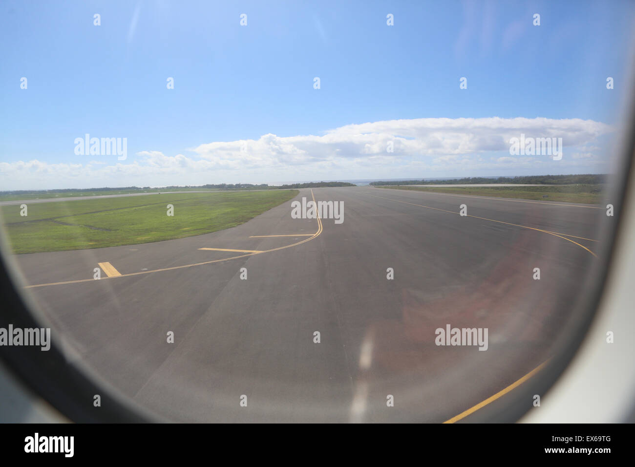 Airplane landing on runway Stock Photo - Alamy