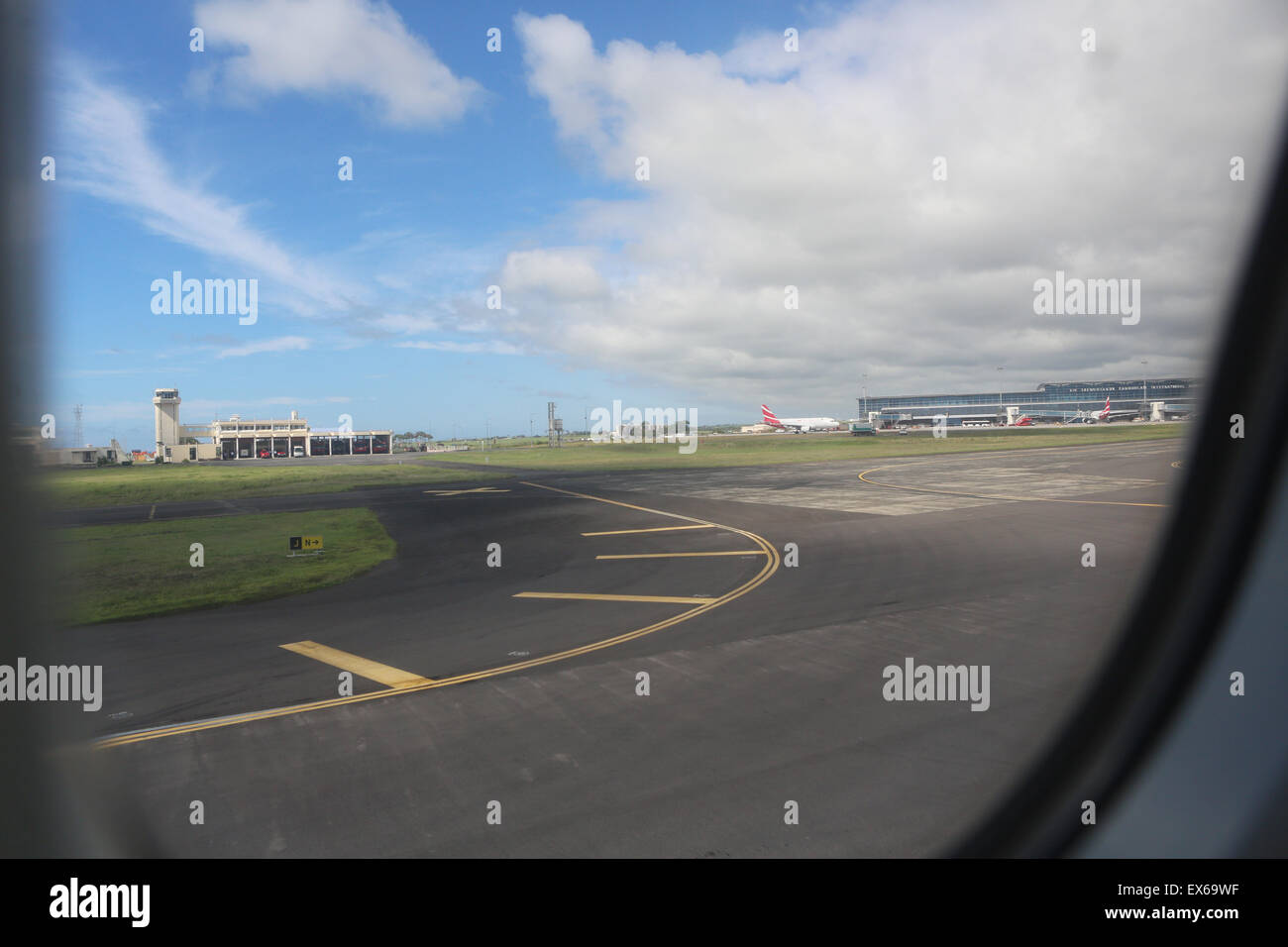 Airplane landing on runway Stock Photo - Alamy