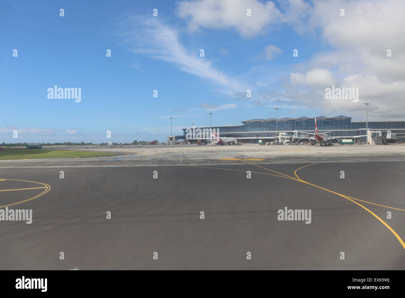 Airplane landing on runway Stock Photo - Alamy