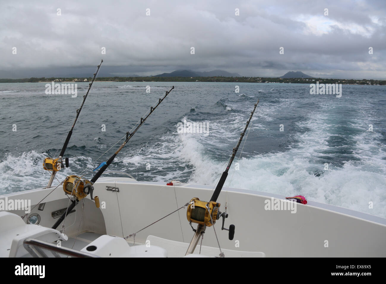 Fishing rod on yacht Stock Photo - Alamy