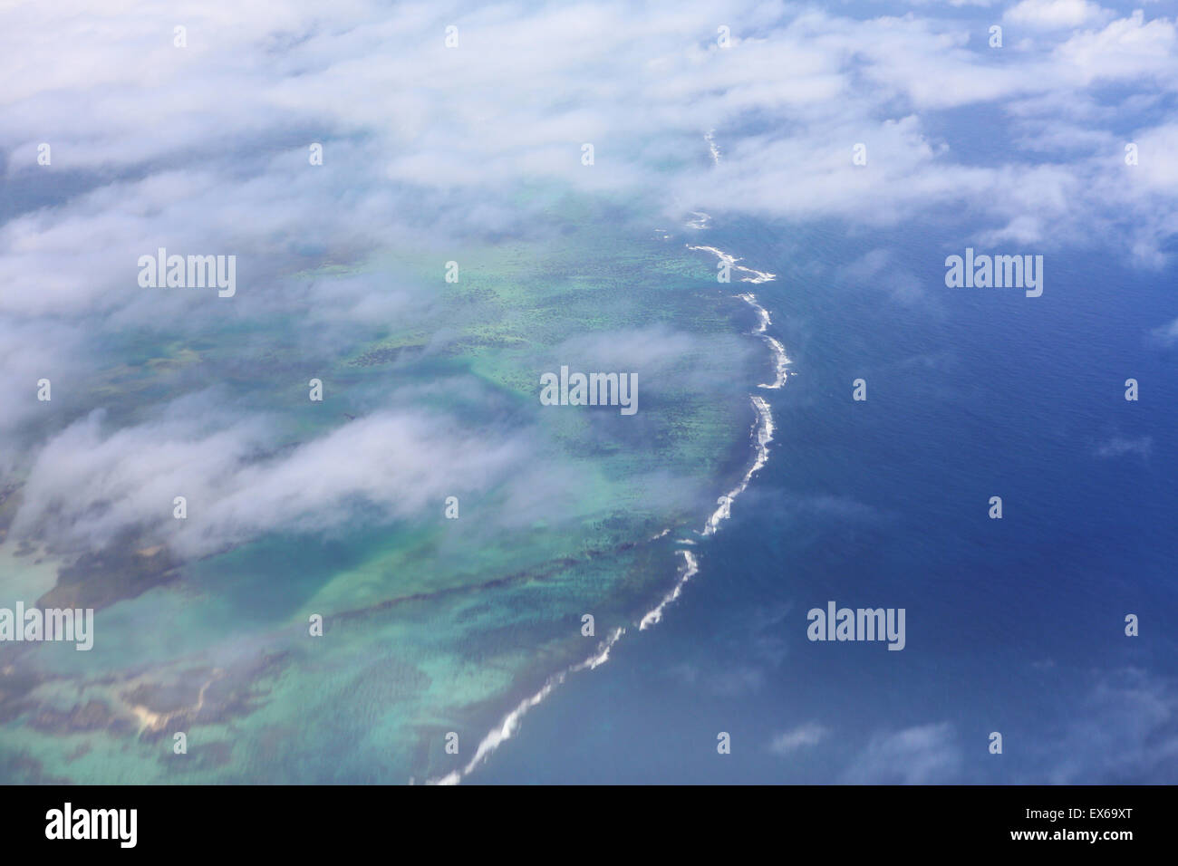 Aerial view of seascape seen through airplane window Stock Photo - Alamy