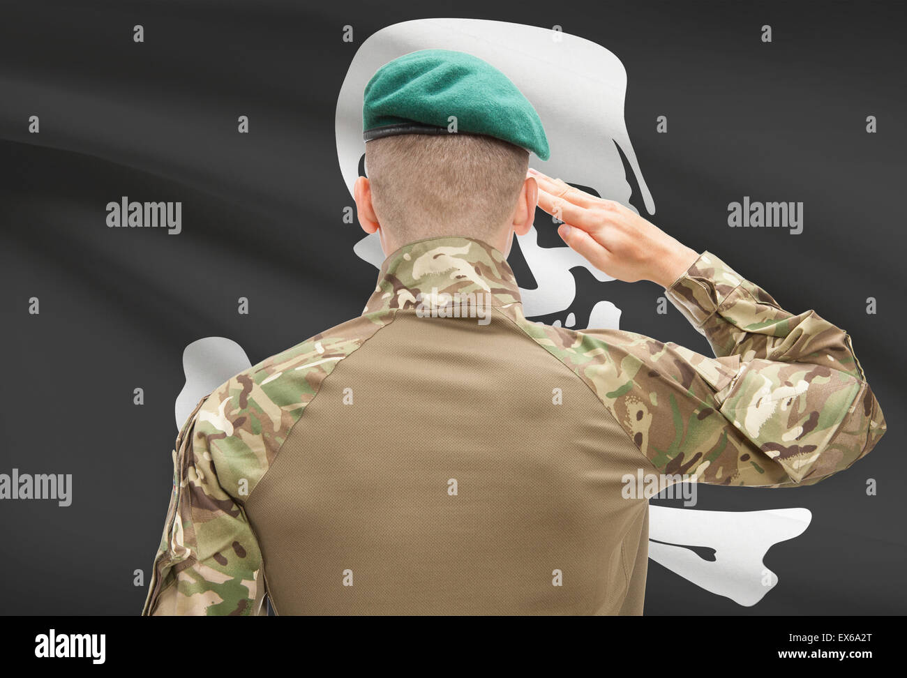 Soldier saluting to US state flag series - Jolly Roger Stock Photo - Alamy