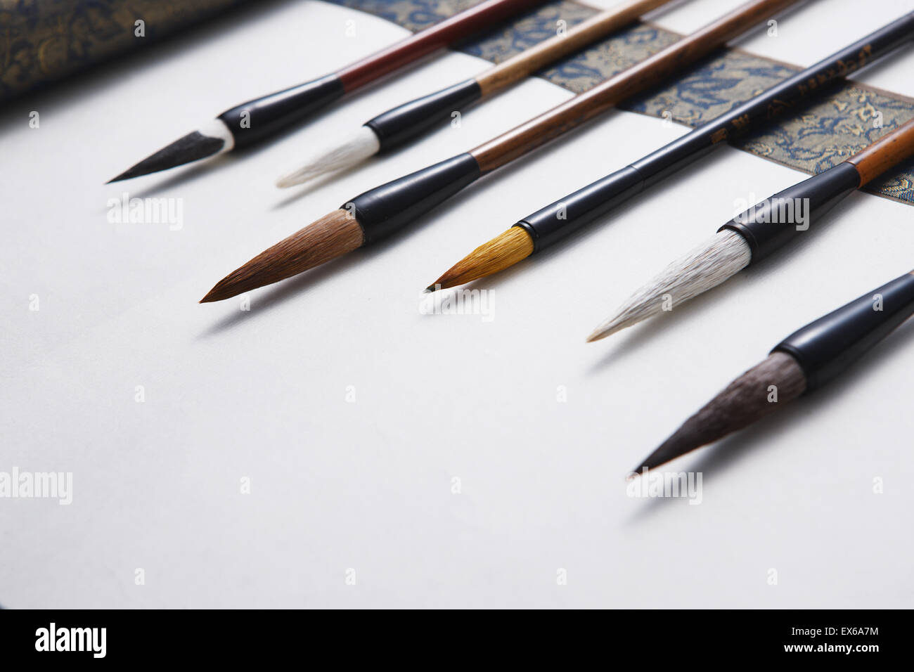 Still life scroll and calligraphy brush Stock Photo - Alamy