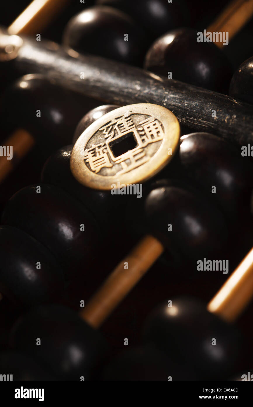 Still life the abacus and copper Coin Stock Photo - Alamy