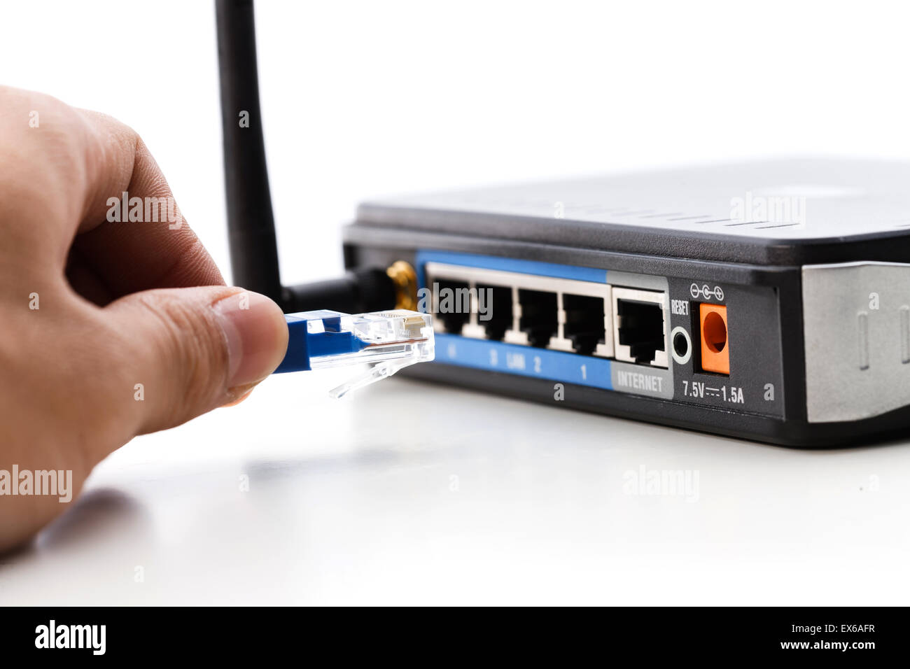 Connecting network plug Stock Photo - Alamy