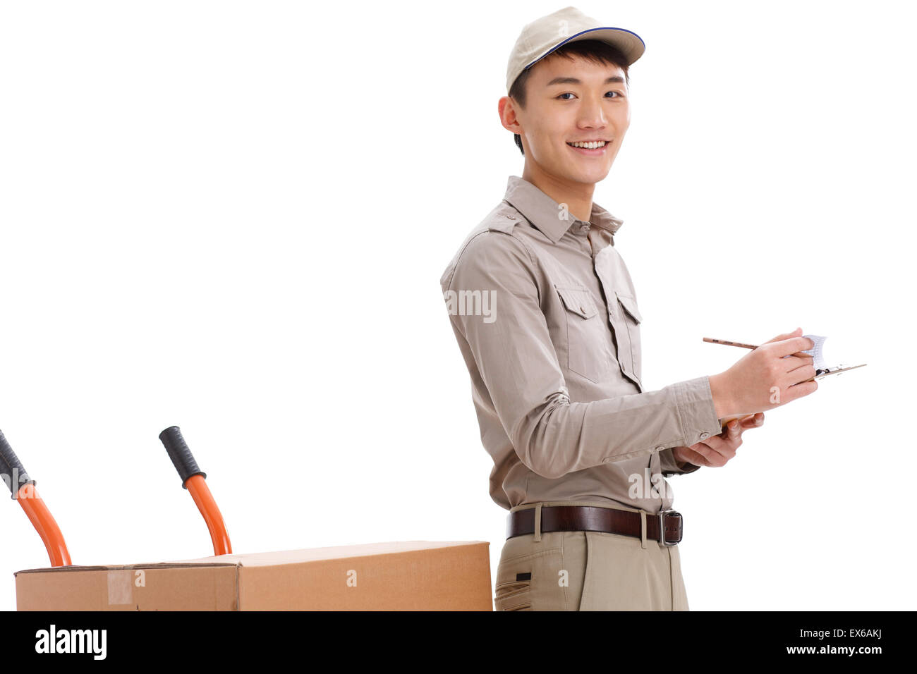 Young man with push cart Stock Photo - Alamy