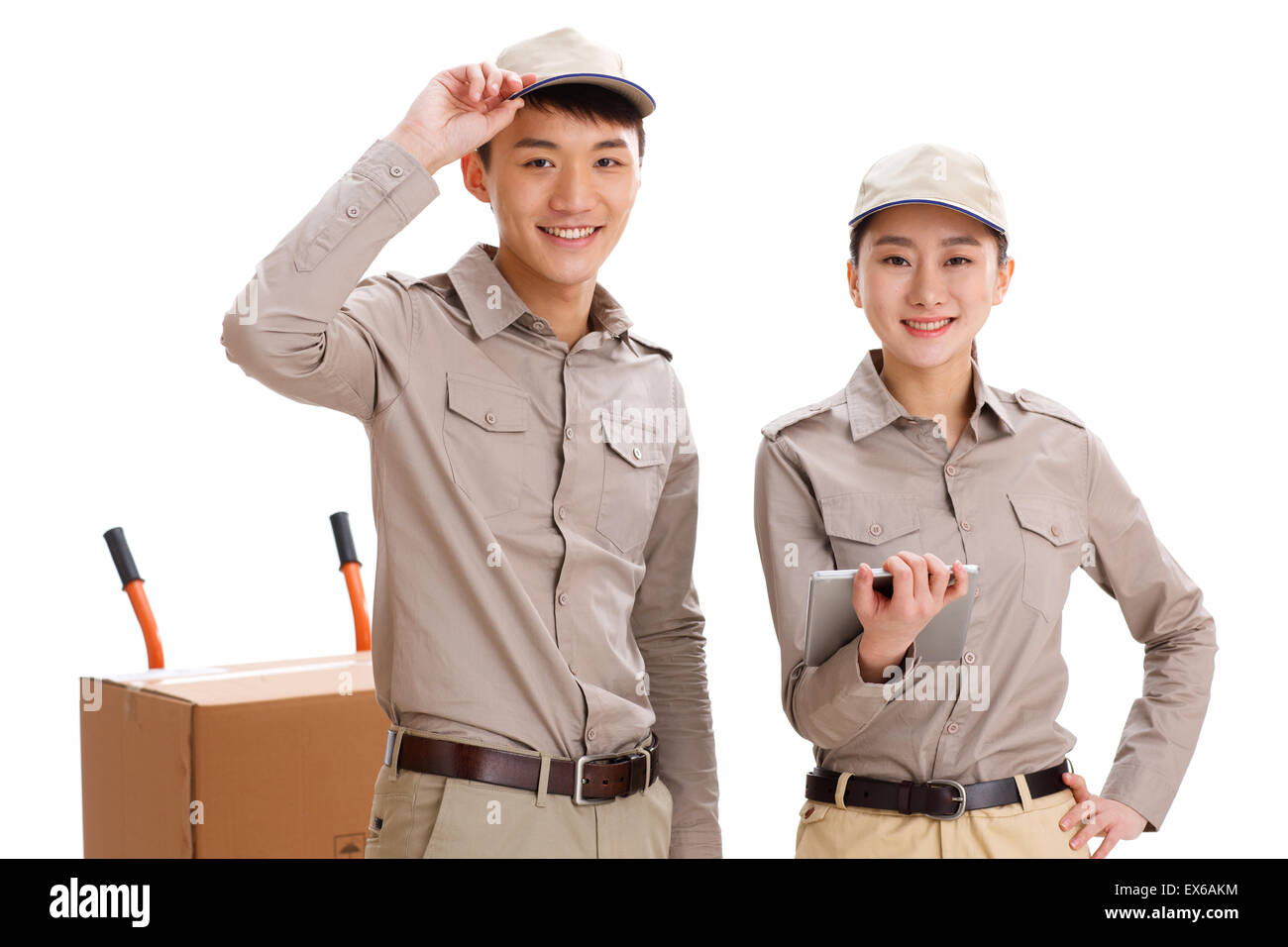 Portrait of young woman and young man with push cart Stock Photo - Alamy