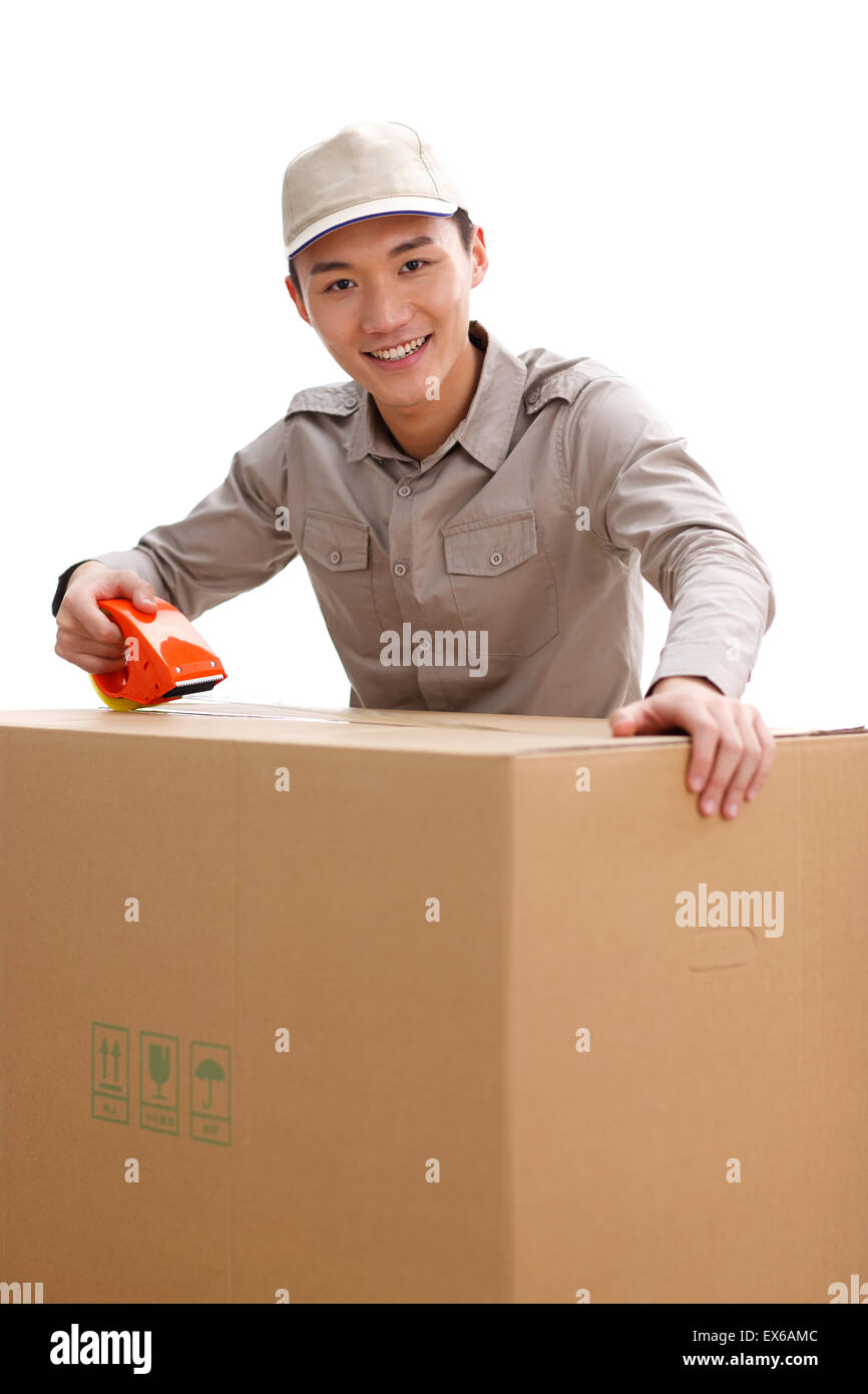 Man packing boxes hi-res stock photography and images - Alamy