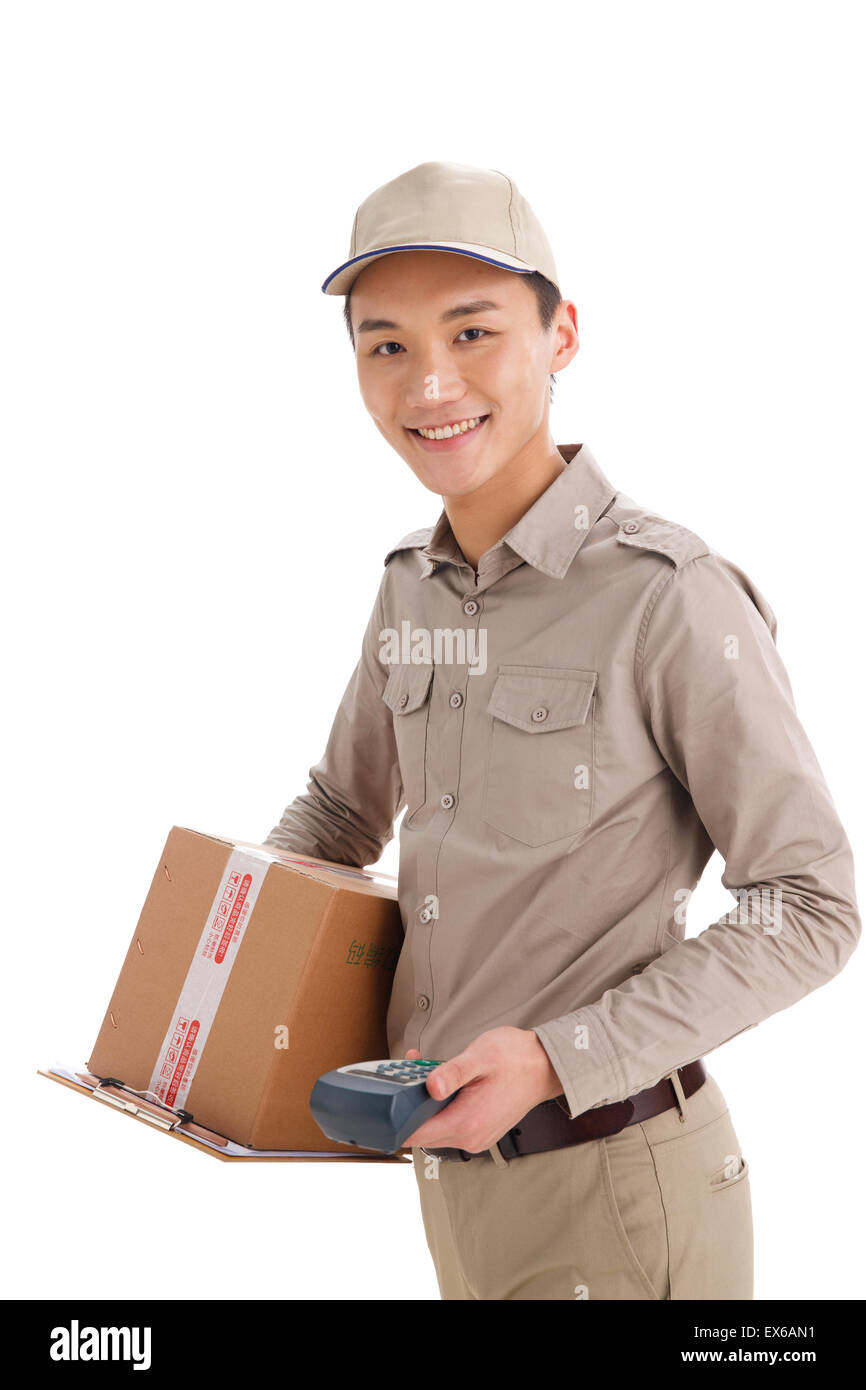 Portrait of young man holding package Stock Photo - Alamy