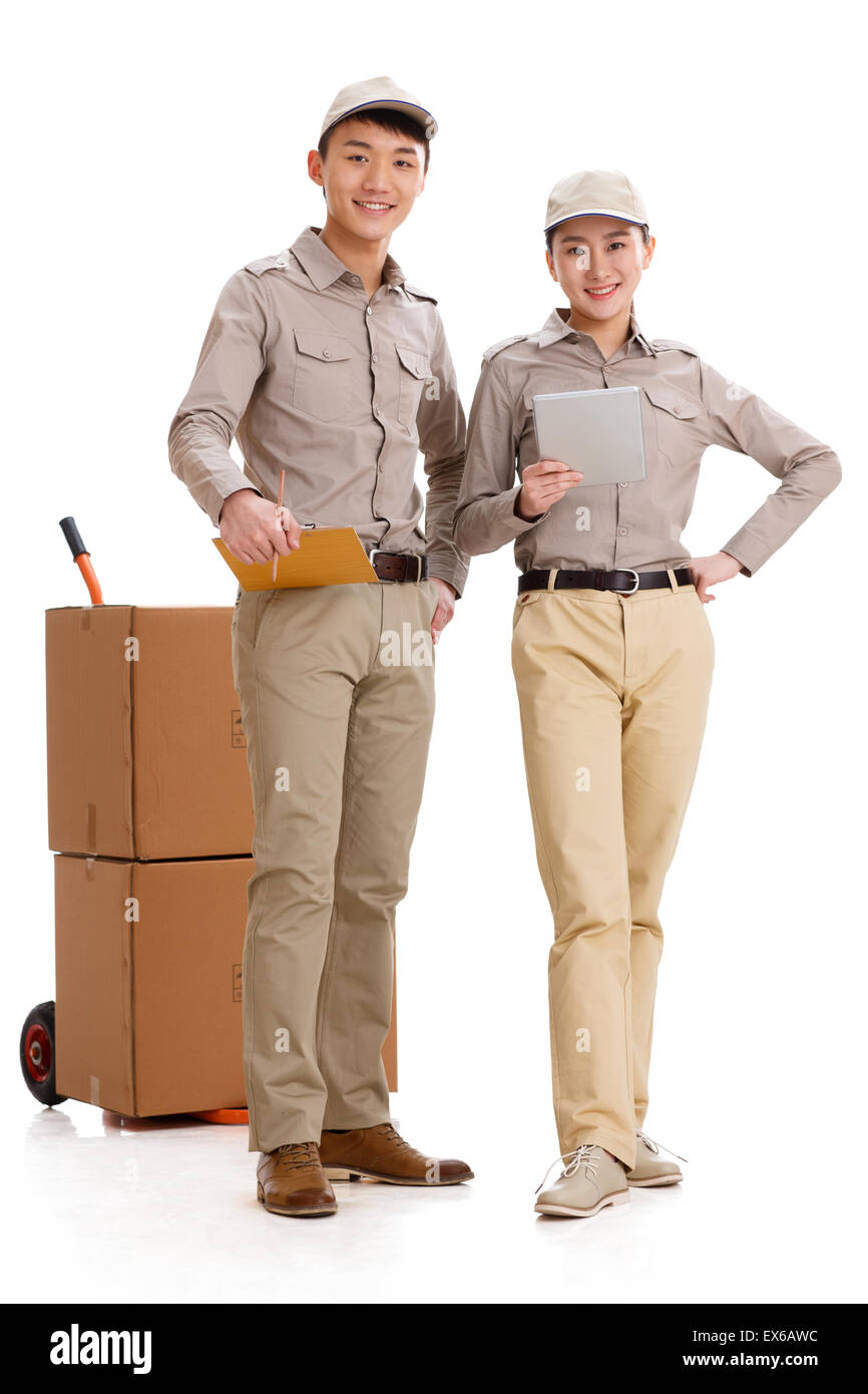 Portrait of young woman and young man with push cart Stock Photo - Alamy