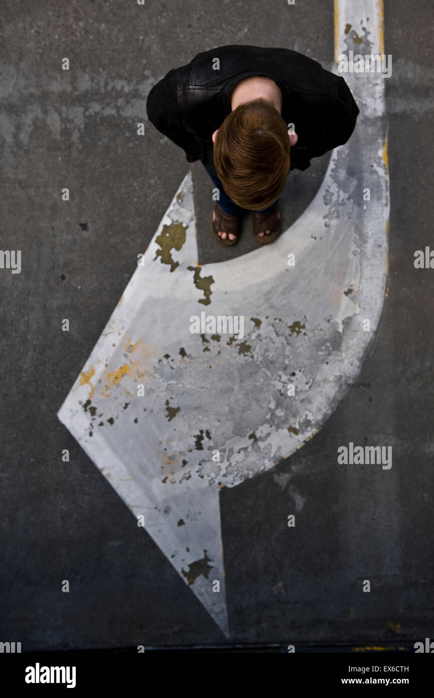 Boy pondering his direction Stock Photo - Alamy