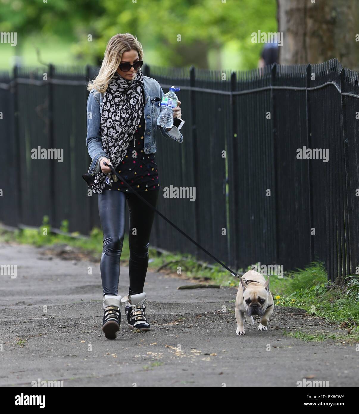 Sarah Harding takes her dog for a walk on a sunny day in Primrose Hill ...