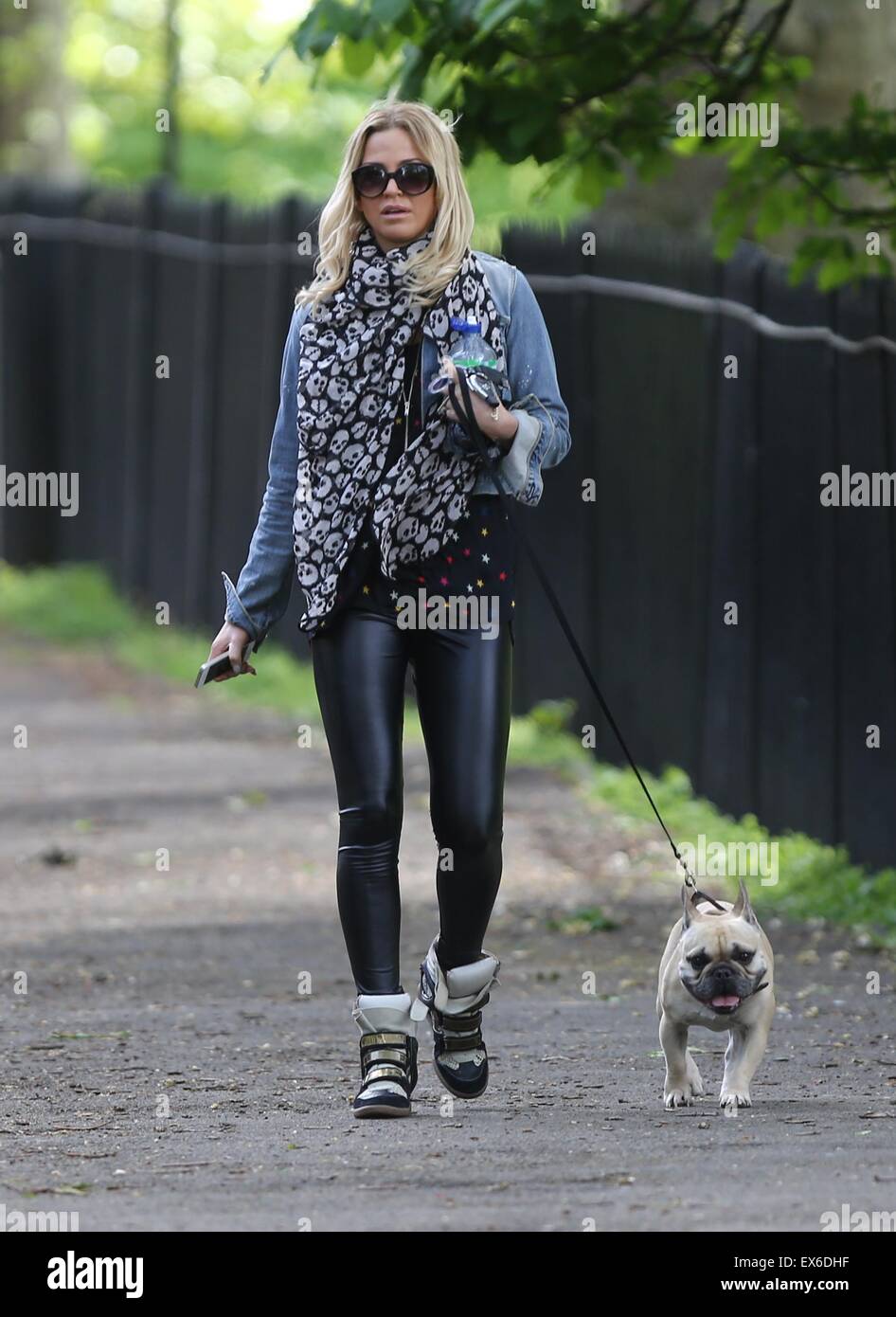 Sarah Harding takes her dog for a walk on a sunny day in Primrose Hill ...