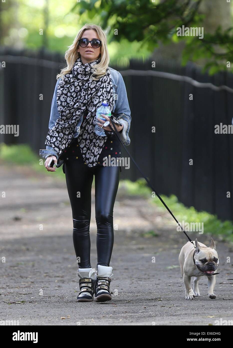 Sarah Harding takes her dog for a walk on a sunny day in Primrose Hill ...