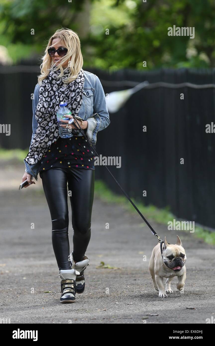 Sarah Harding takes her dog for a walk on a sunny day in Primrose Hill ...