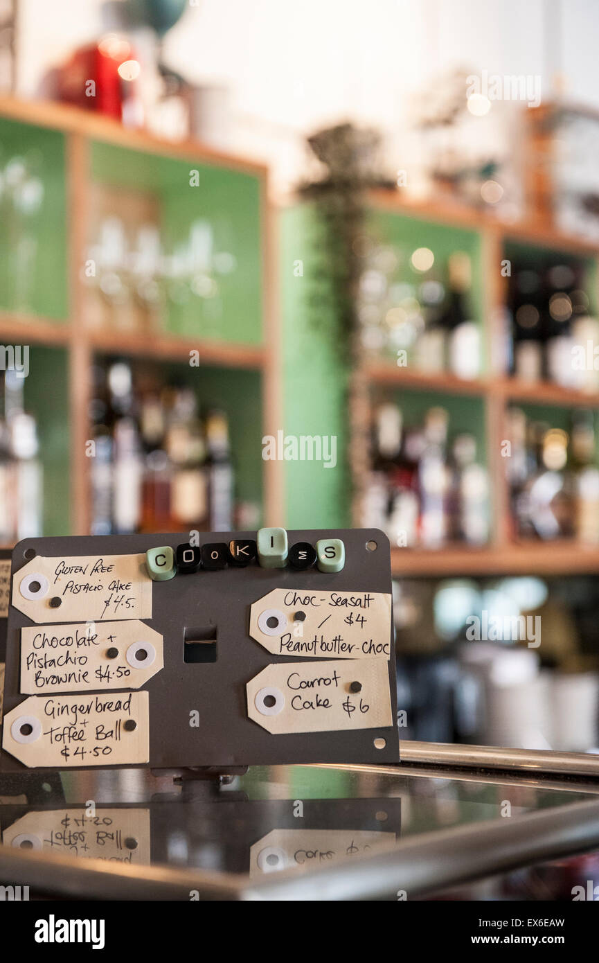 Cake display in a cafe Stock Photo - Alamy