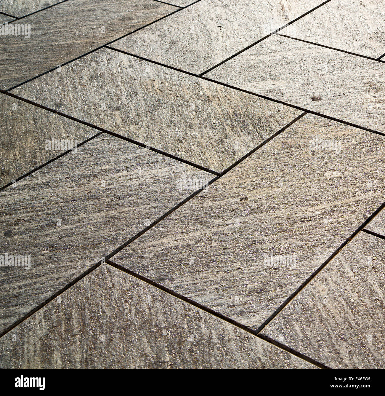 in mozzate street lombardy italy varese abstract pavement of a curch ...