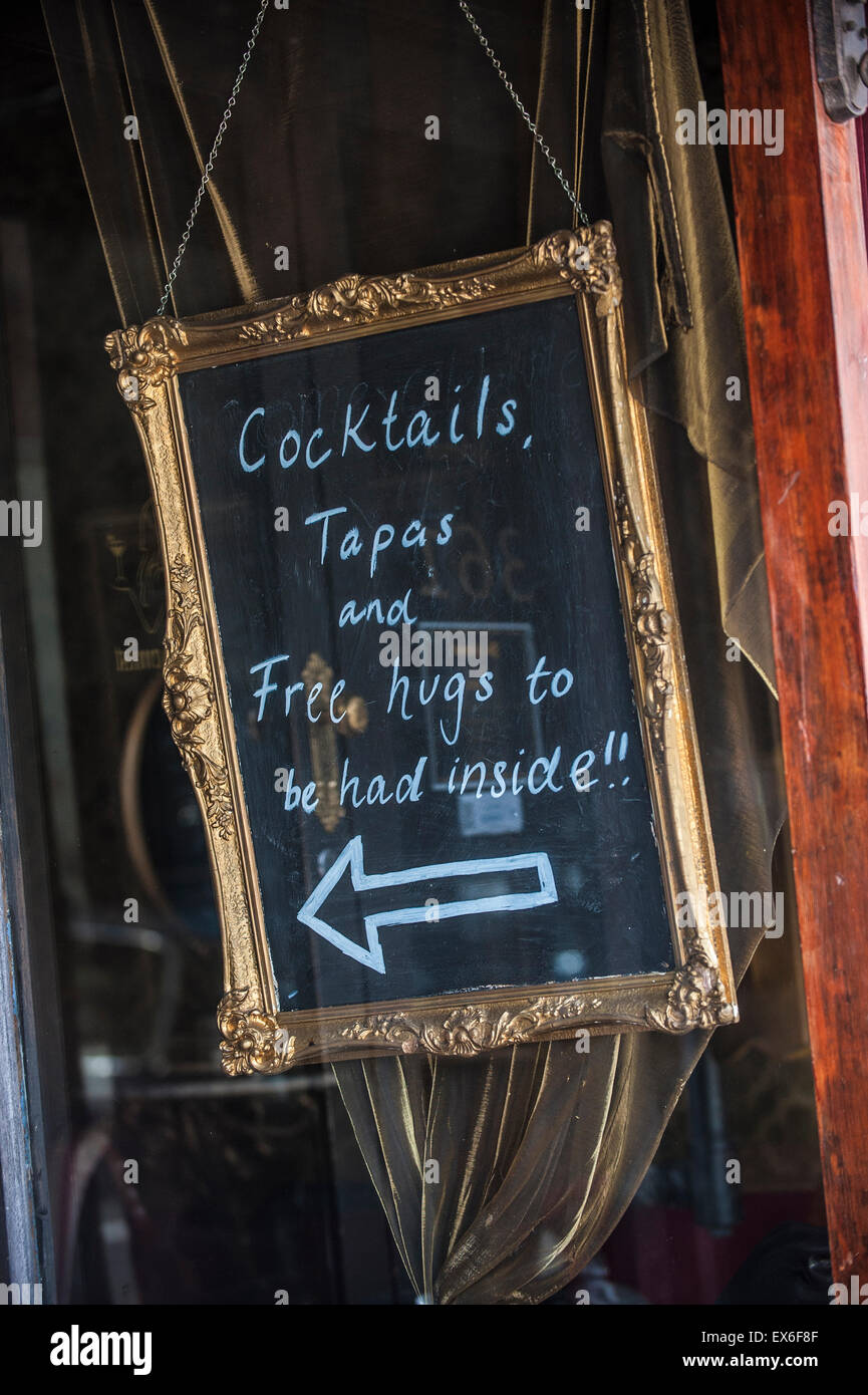 Funny sign in bar window Stock Photo - Alamy